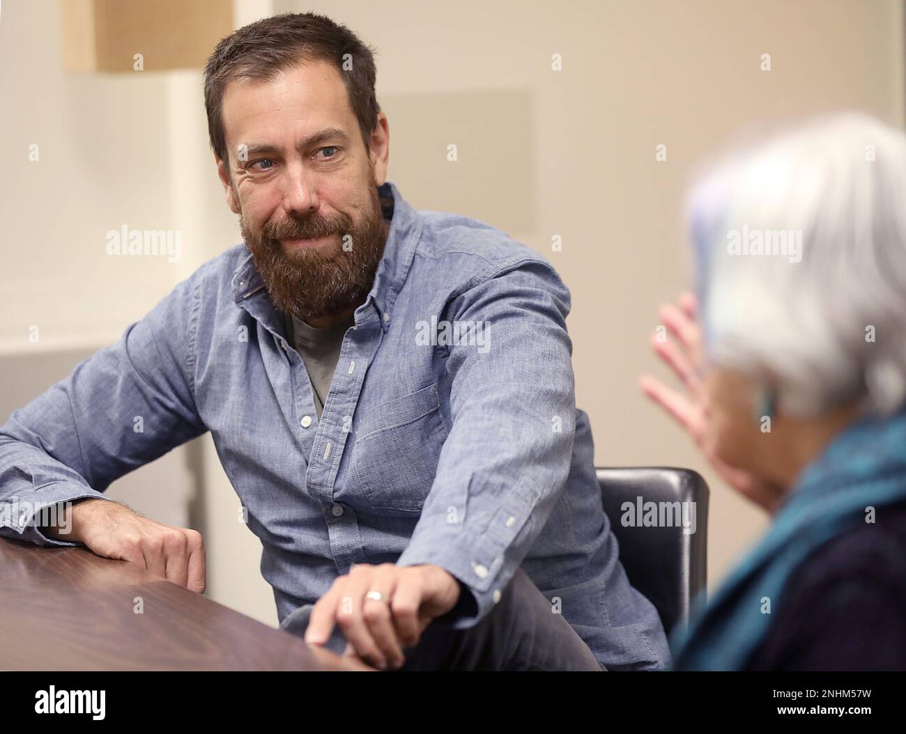 Filmmaker Dan Krauss (left) listens to past nurse Alison Moed (right ...