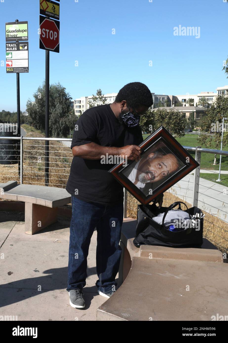 Close family friend Tyrone Easter, Jr. gets a picture of Jerry Lawson ...