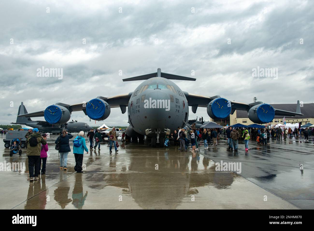 The crowd observes the C-17 Globemaster III display at the Arctic ...