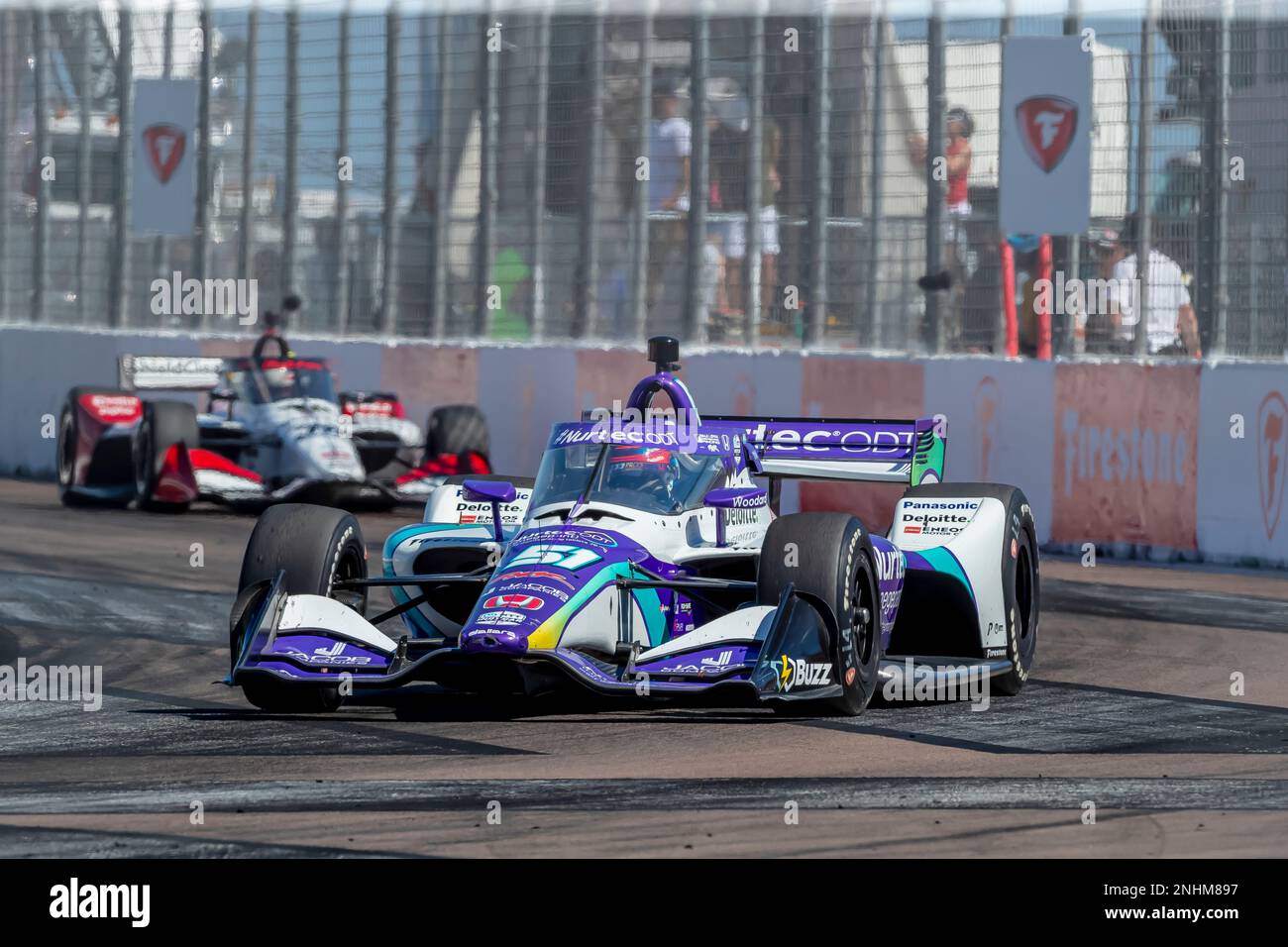 TAKUMA SATO (51) of Tokyo, Japan races in the Firestone Grand Prix of ...
