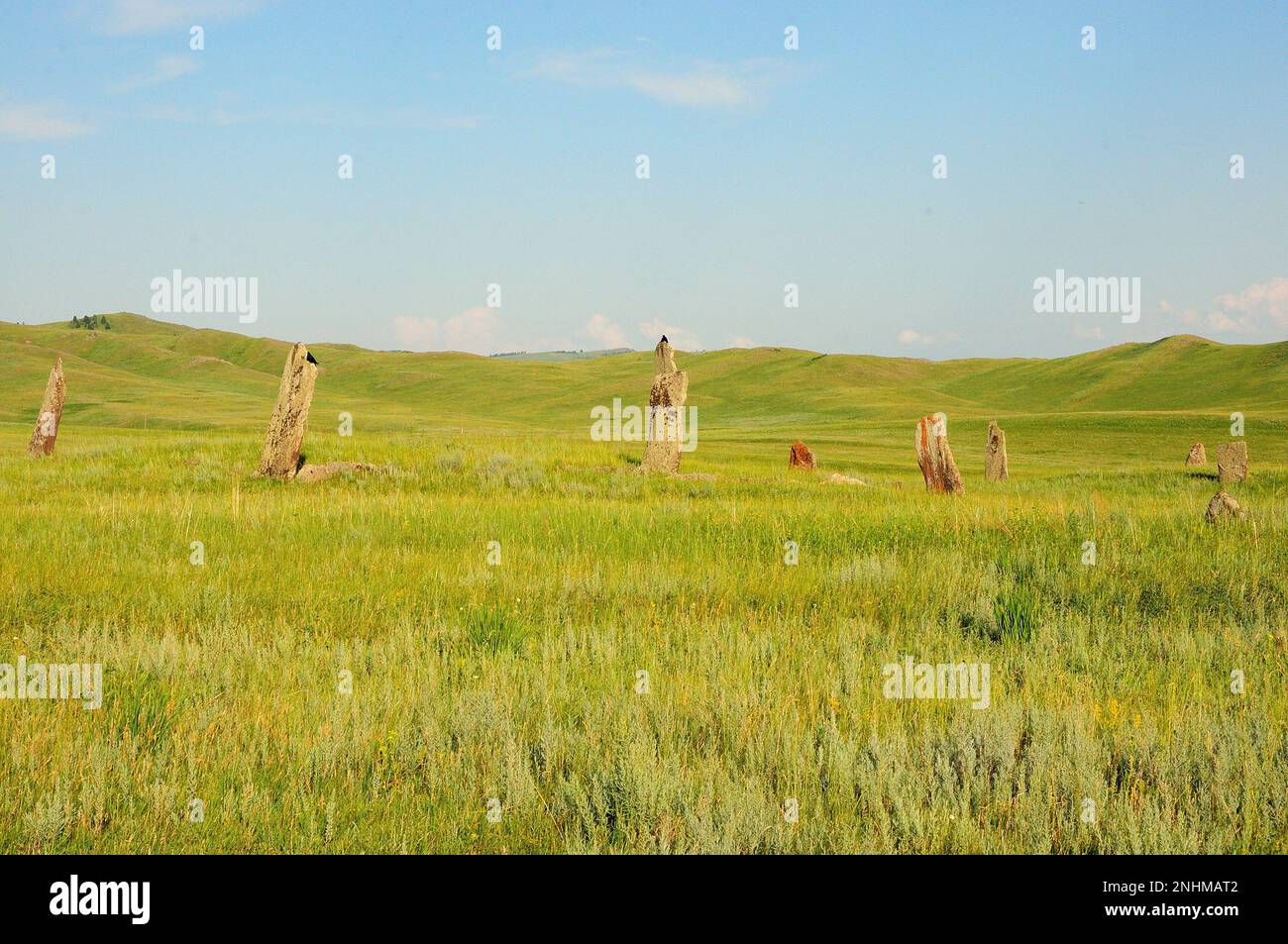 A group of ancient burial high stones in a picturesque valley ...