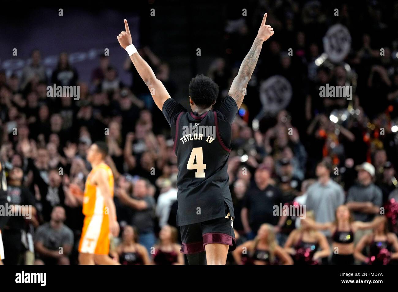 Texas A&M guard Wade Taylor IV (4) reacts after the team's 68-63 win over Tennessee in an NCAA ...