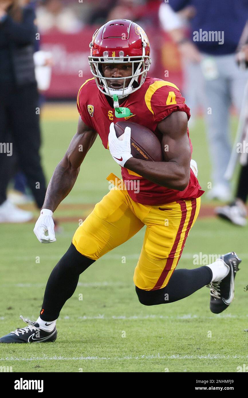 USC Trojans wide receiver Mario Williams (4) runs upfield with a reception before an NCAA ...