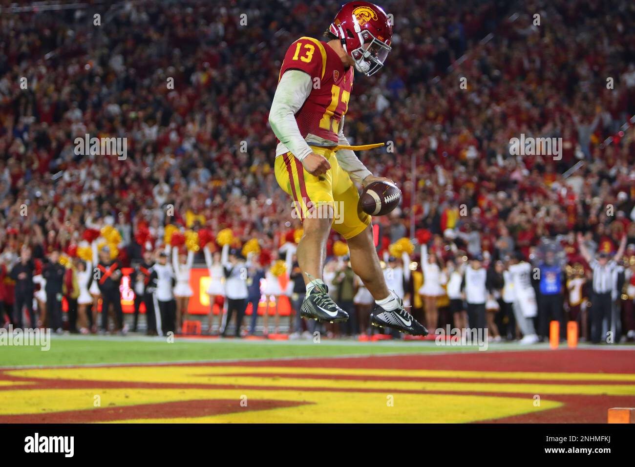 USC Trojans quarterback Caleb Williams (13) leaps in the end zone after ...