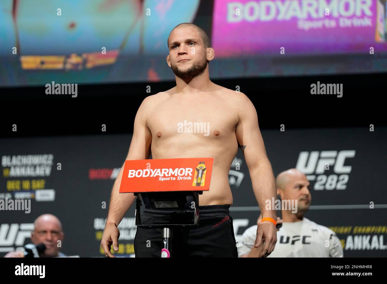 LAS VEGAS, NV - DECEMBER 09: Alex Moreno steps on the scale for the ...