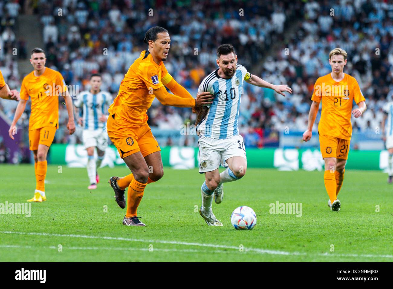 LUSAIL, - DECEMBER 09: Netherlands defender Virgil Van Dijk defends ...
