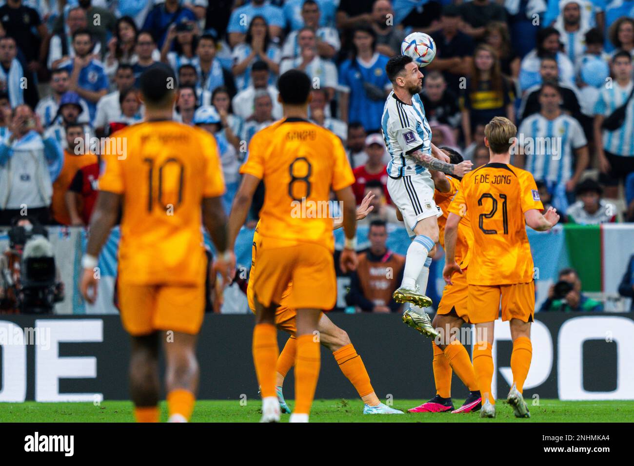 Argentina forward Lionel Messi contends a header during the ...