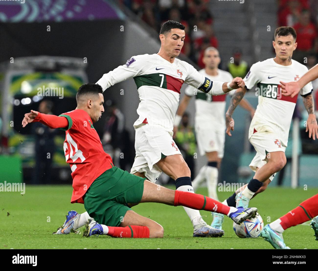 Morocco's Badr BENOUN stops Portugal's CRISTIANO RONALDO during the ...