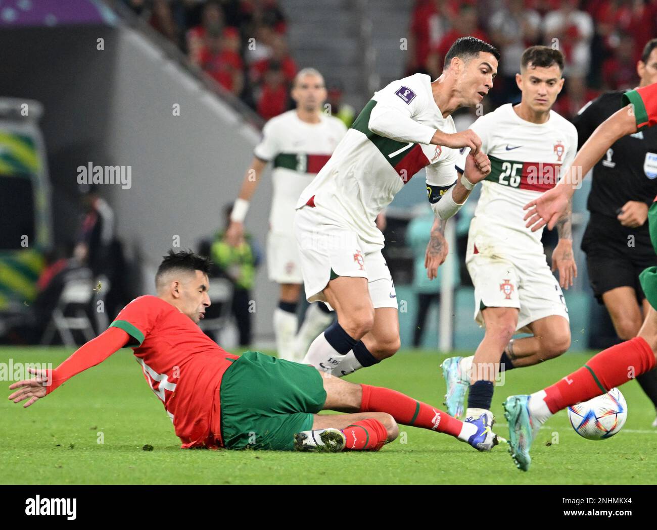 Morocco's Badr BENOUN stops Portugal's CRISTIANO RONALDO during the ...