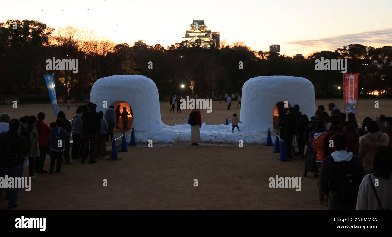 Visitors enjoy staying inside a kamakura, snow dome at Osaka Castle ...