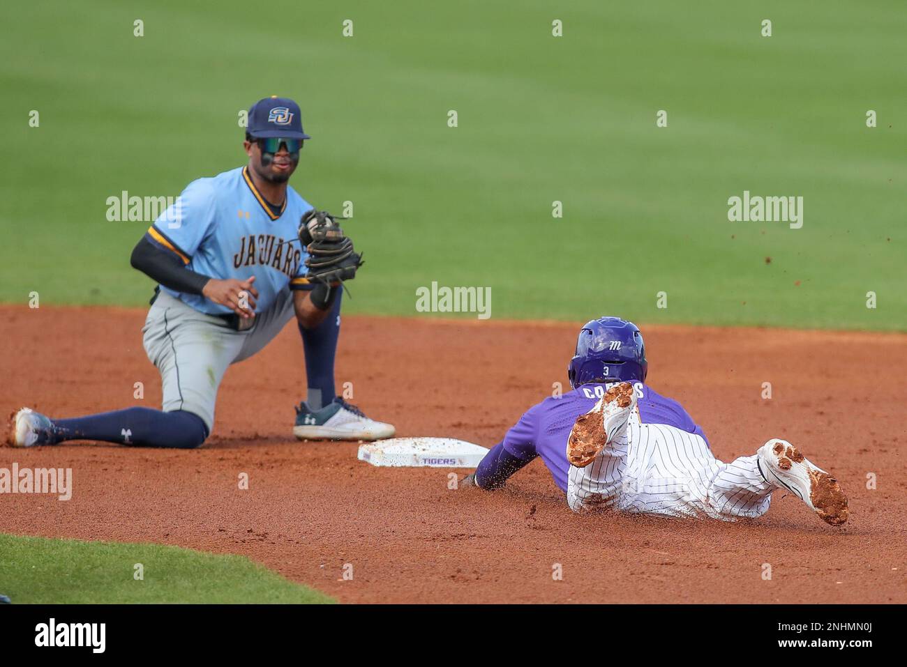 Baton Rouge, LA, USA. 21st Feb, 2023. LSU's Dylan Crews (3) slides into ...