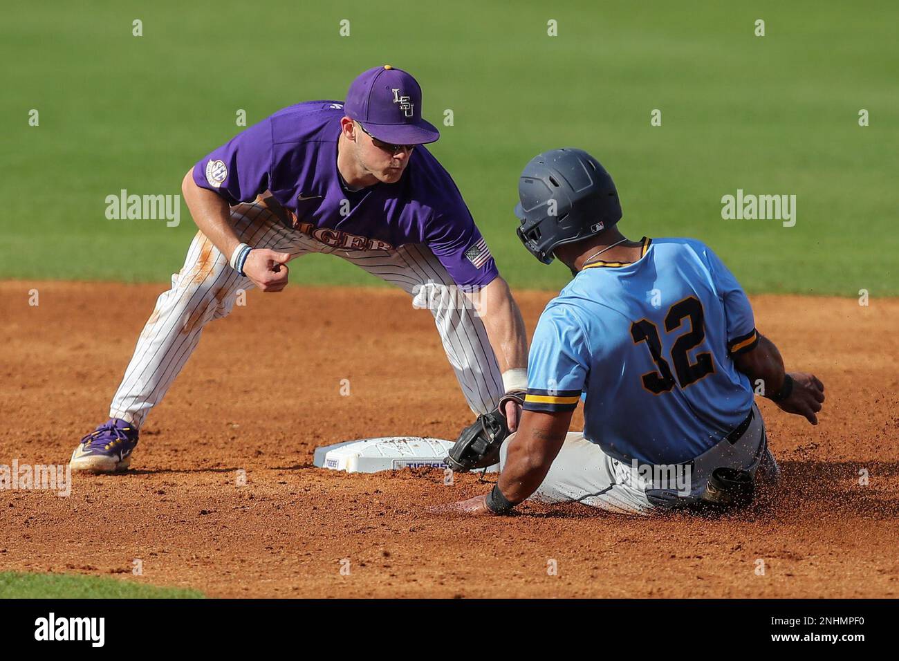 Baton Rouge, LA, USA. 21st Feb, 2023. LSU's Gavin Dugas (8) applies the ...