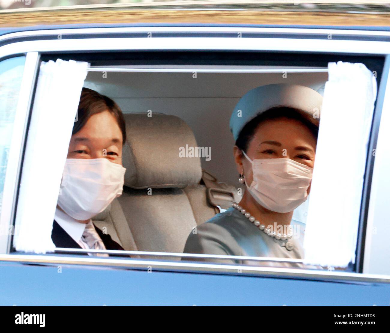 Japanese Emperor Naruhito and Empress Masako enter Sento Gosho at Akasaka Palace to greet ...