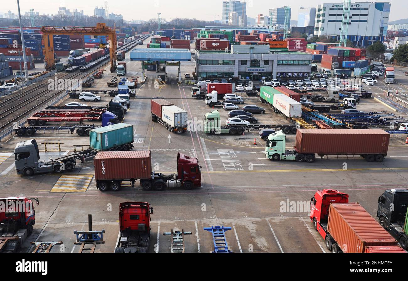 Container trucks run at the Inland Container Depot in Uiwang, a ...