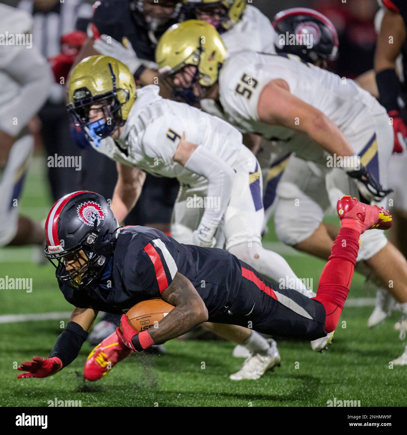 Aliquippa's John Tracy is upended by Bishop McDevitt defenders Chase ...