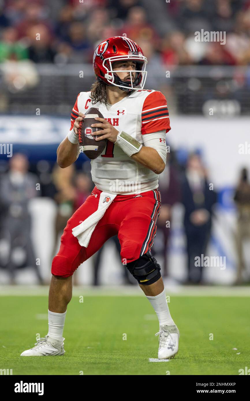 Utah quarterback Cameron Rising (7) drops back to pass the ball against USC in the Pac 12 ...