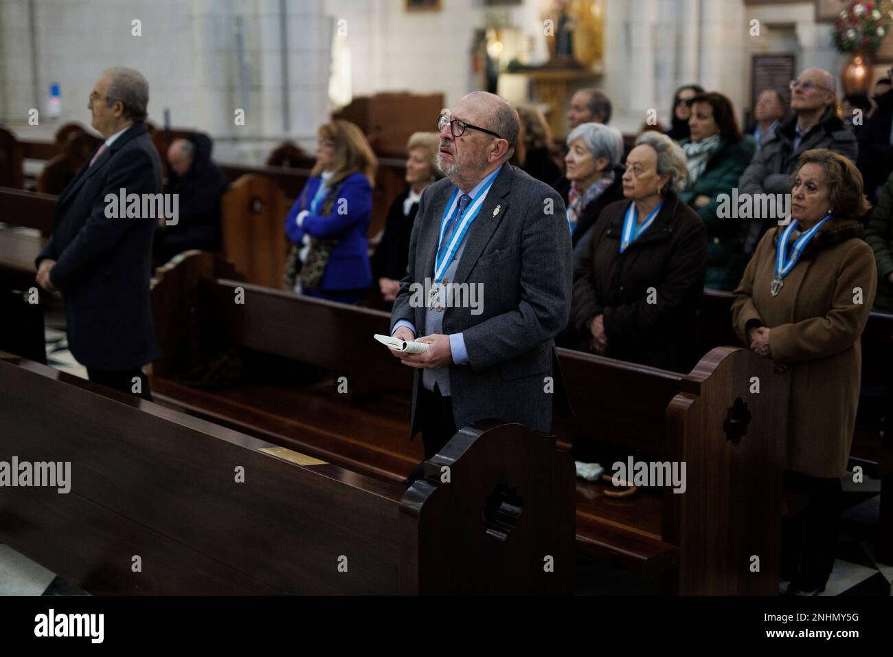 A parishioner attends a solemn mass in honor of the Immaculate ...