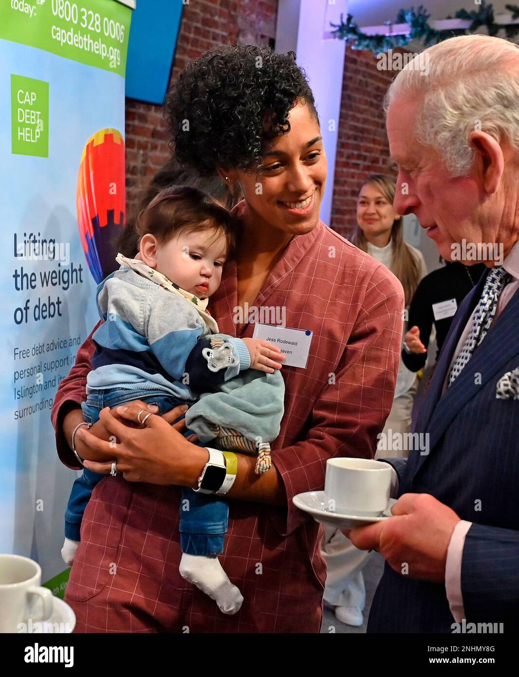 Britain's King Charles III meets Jess Rodewald, holding 7-month-old ...