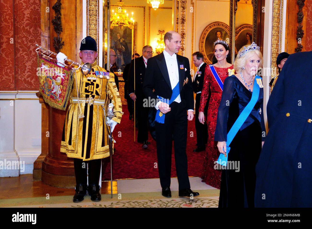 Britain's Prince William, center, and Kate, Princess of Wales, and Camilla, the Queen Consort ...