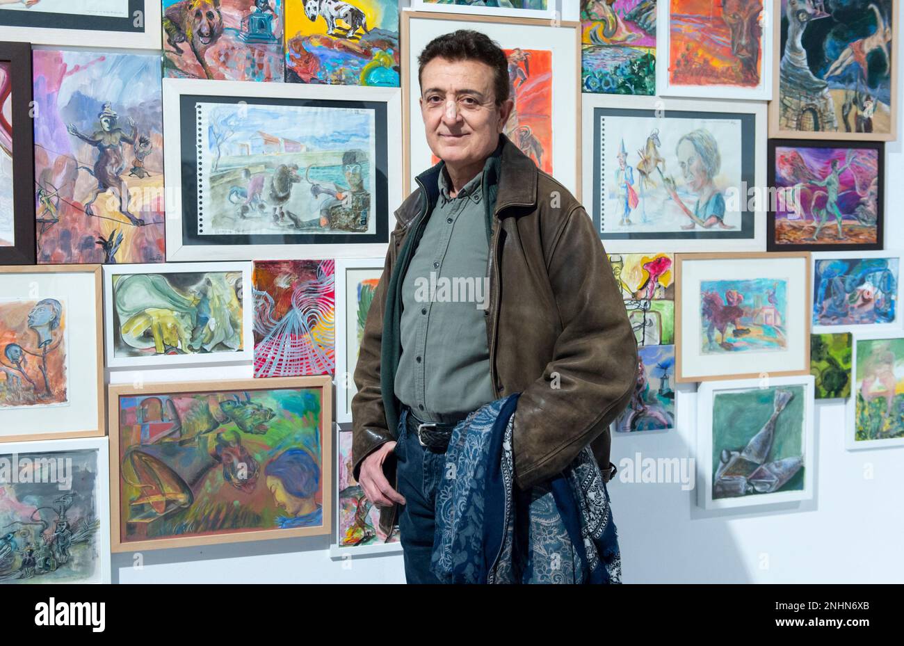 Manolo García poses next to the works in his exhibition at the Casa de ...
