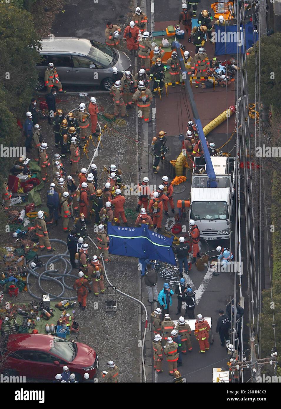 An aerial photo shows firefighters conducting a rescue at a site that ...