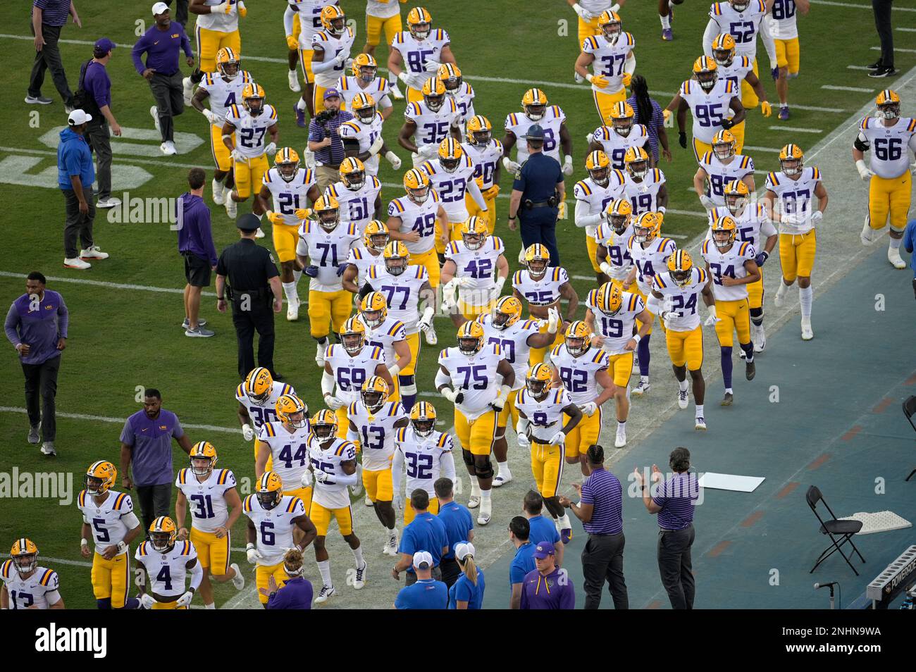 LSU team members leave the field after warming up before an NCAA ...