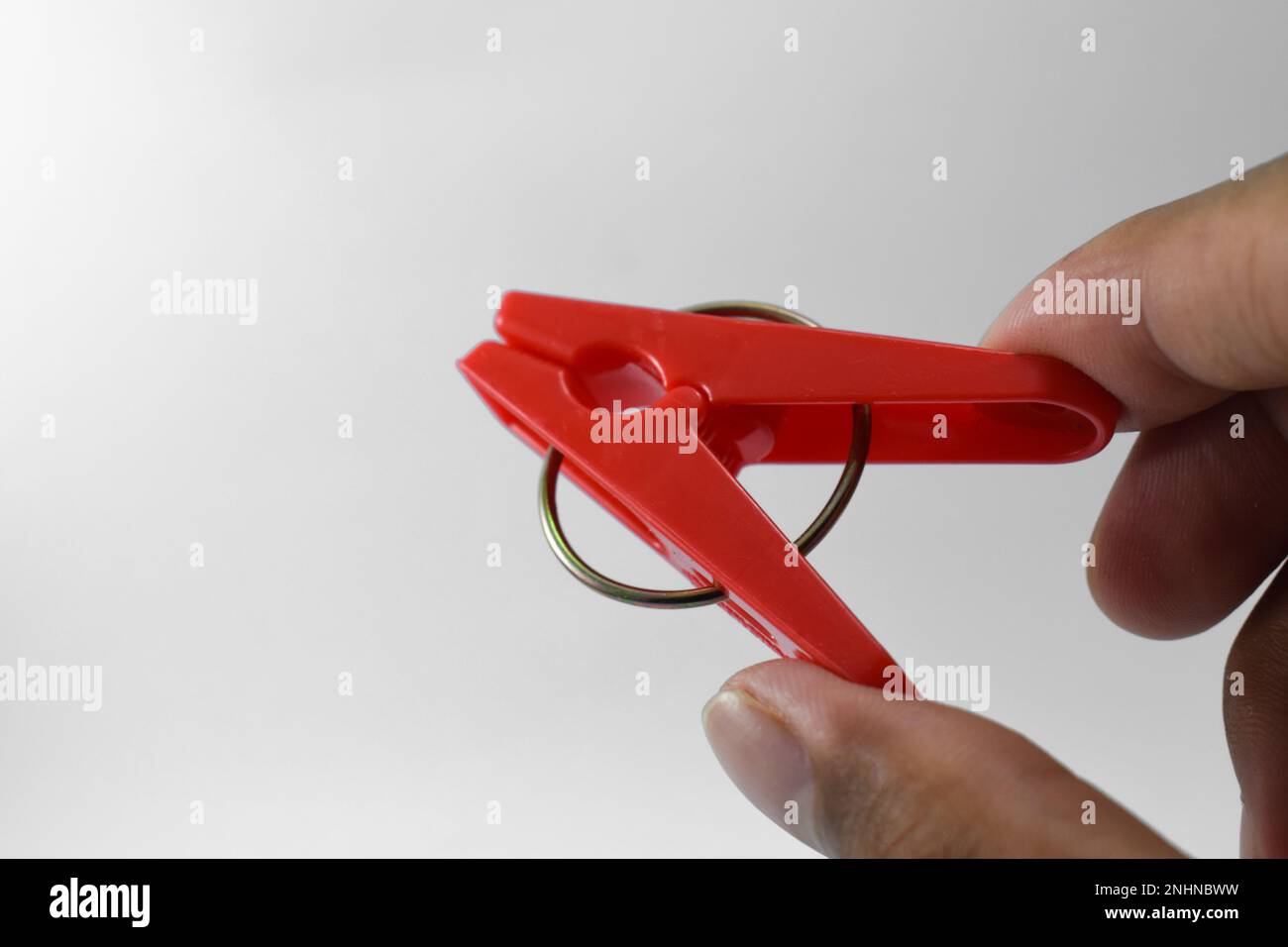Red plastic clothespin isolated on white background. Plastic clips ...
