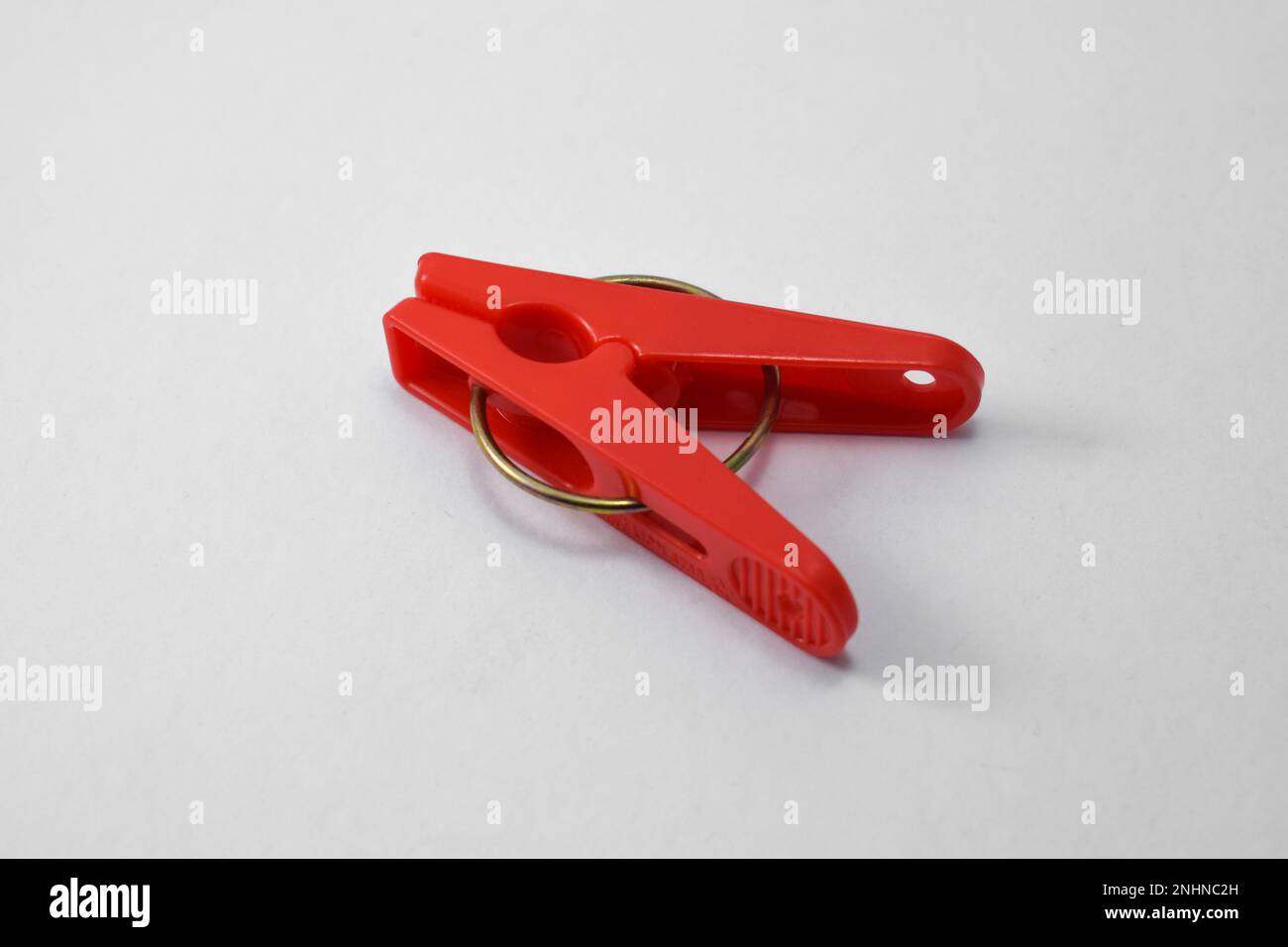 Red plastic clothespin isolated on white background. Plastic clips ...