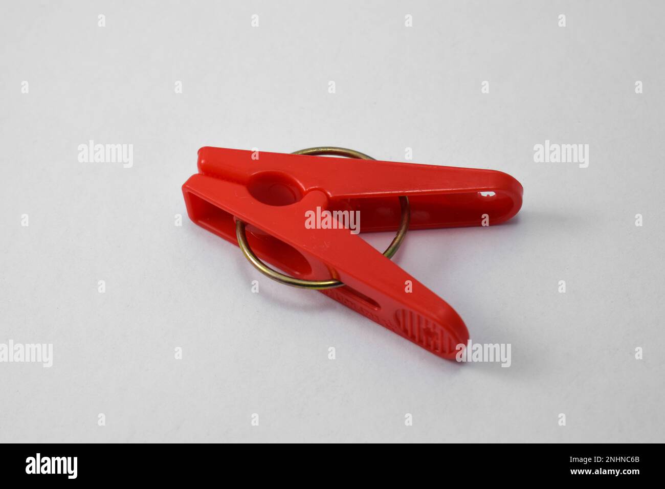 Red plastic clothespin isolated on white background. Plastic clips ...