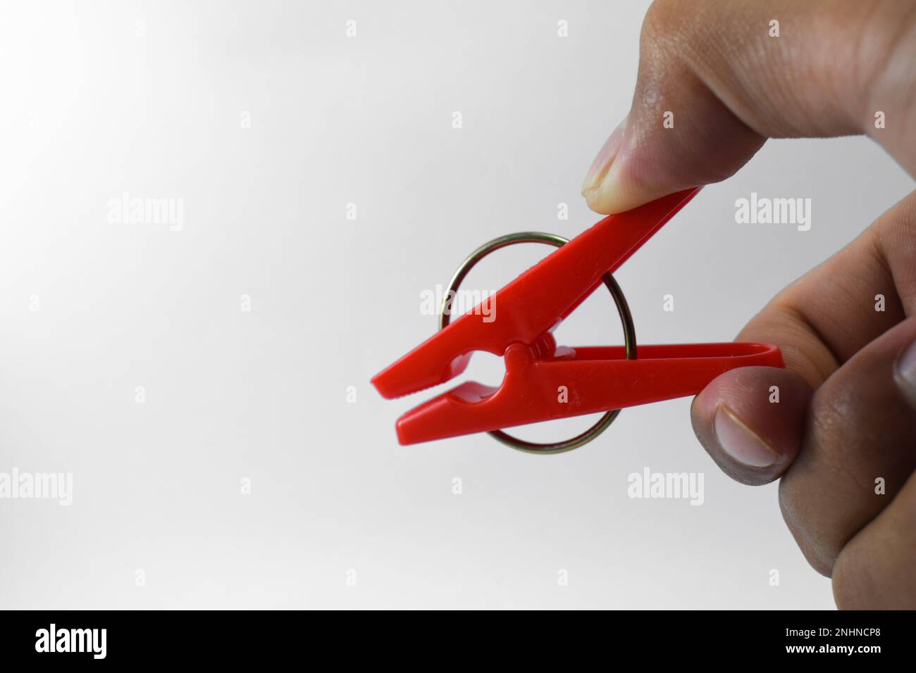 Red plastic clothespin isolated on white background. Plastic clips ...