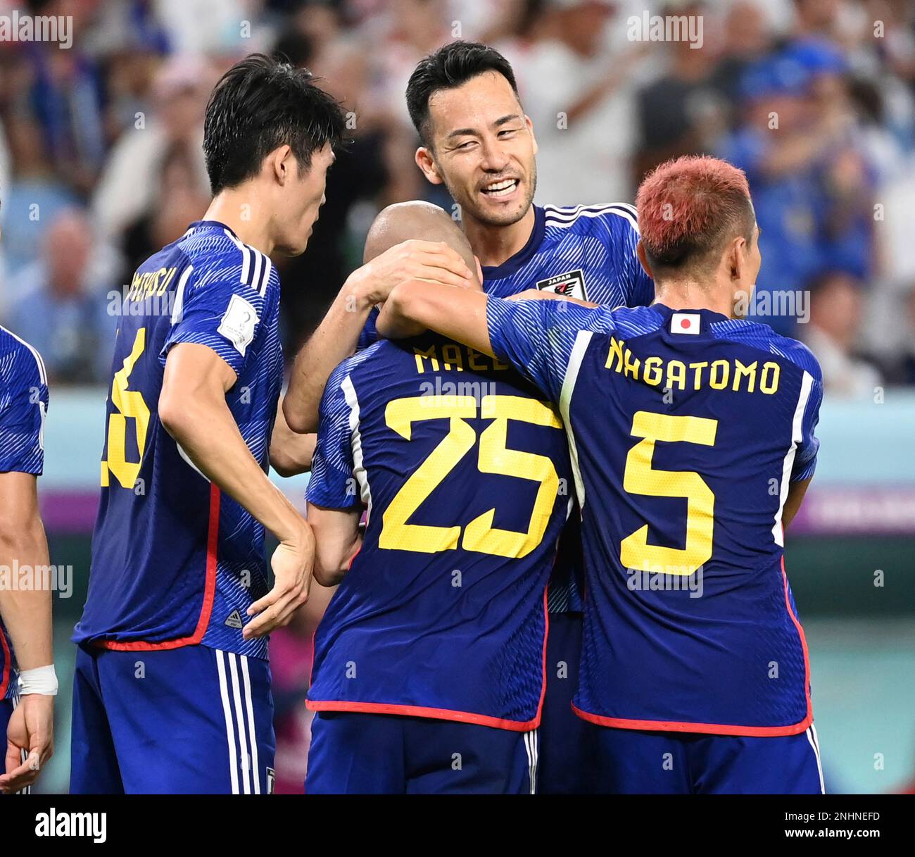 Japan's Daizen Maeda (25) hugs Maya Yoshida after opening a goal during ...