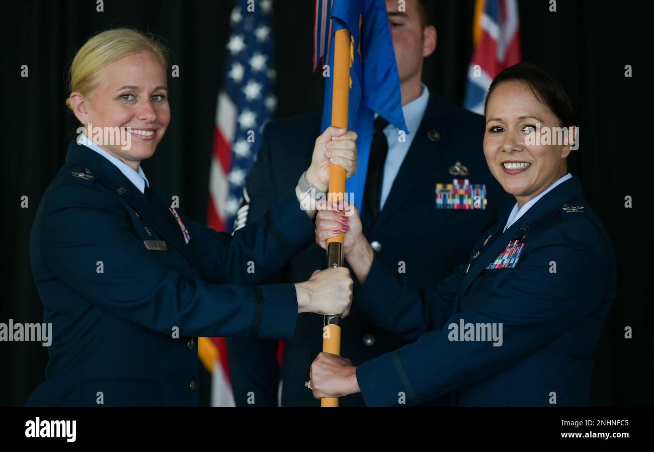 Col. Michele Lo Bianco, 15th Wing commander, hands the guidon to Col ...