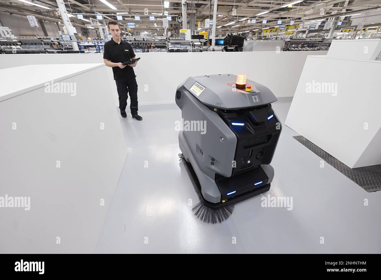 Winnenden, Germany. 20th Feb, 2023. An employee of Alfred Kärcher SE ...