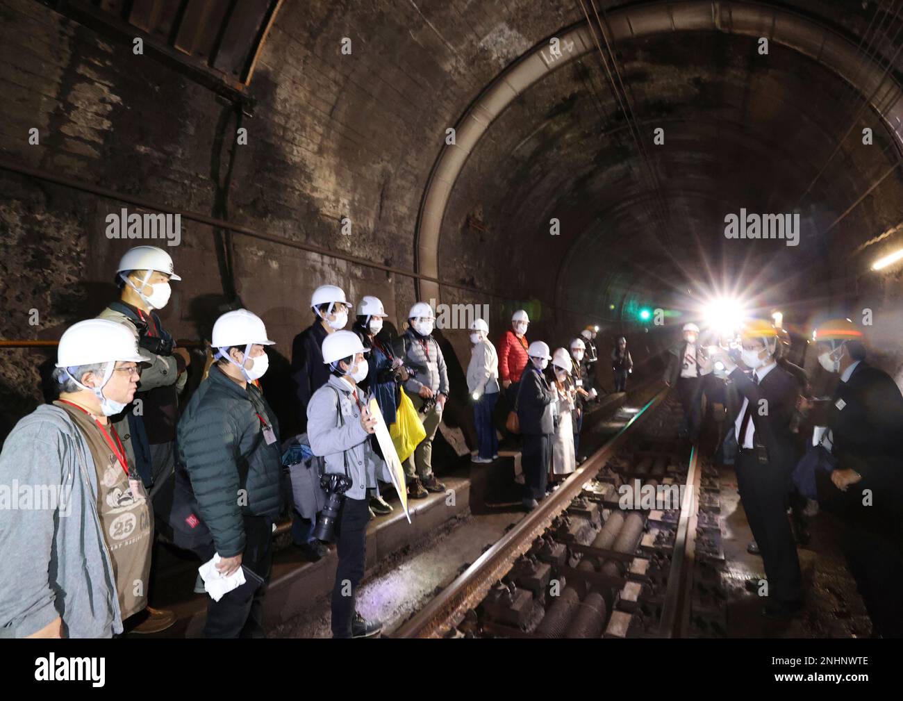 Visitors enjoy walking inside of the Kanmon Railway Tunnel during an ...