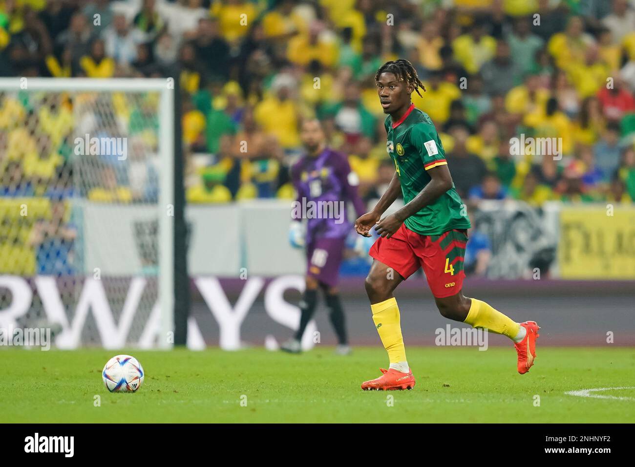 LUSAIL, QATAR - DECEMBER 2: Player of Cameroon Christopher Wooh drives ...