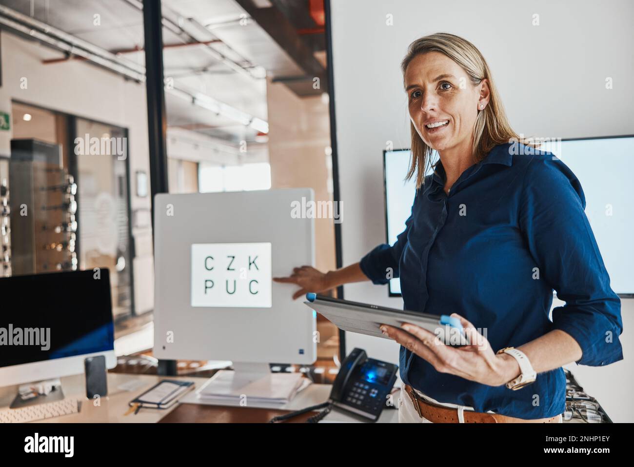 Eye chart exam, woman optometrist and reading test for eyes health and ...