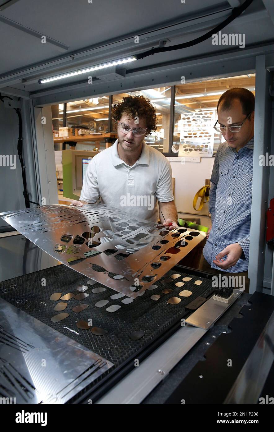 Senior mechanical engineer Jason Petersen (left) and founder and CEO ...