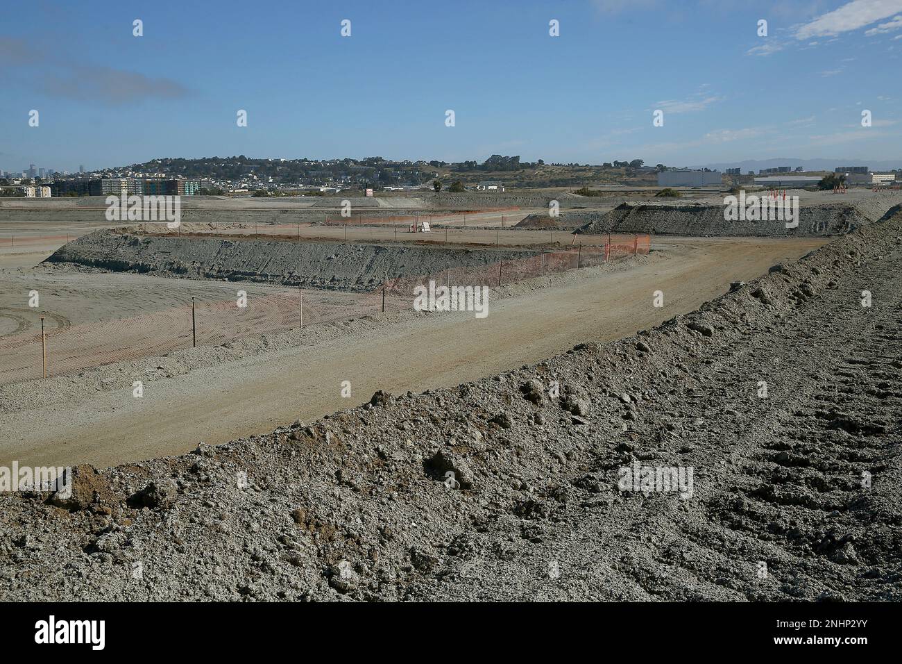 Major construction on a huge dirt platforms on the former site of ...