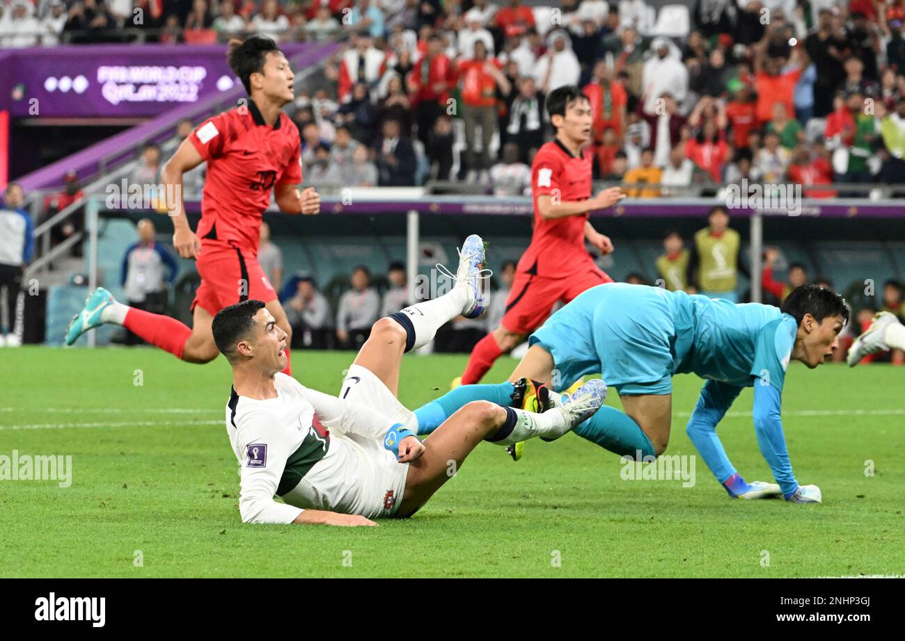 Portugal's Cristiano Ronaldo (L, below) has a chagrined face after ...