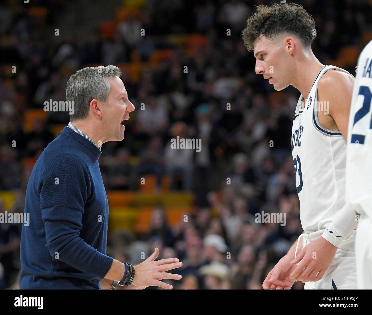 Utah State coach Ryan Odom talks to forward Taylor Funk during a ...