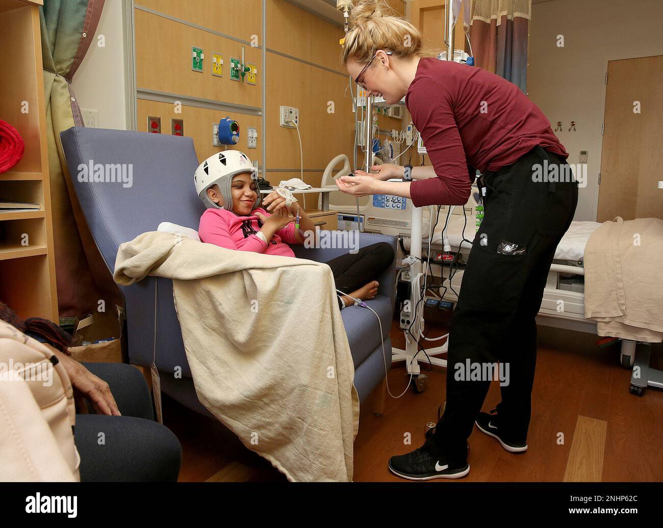 Kierra Ellis (left), 10 years old, with nurse Haley Hunsicker in her ...