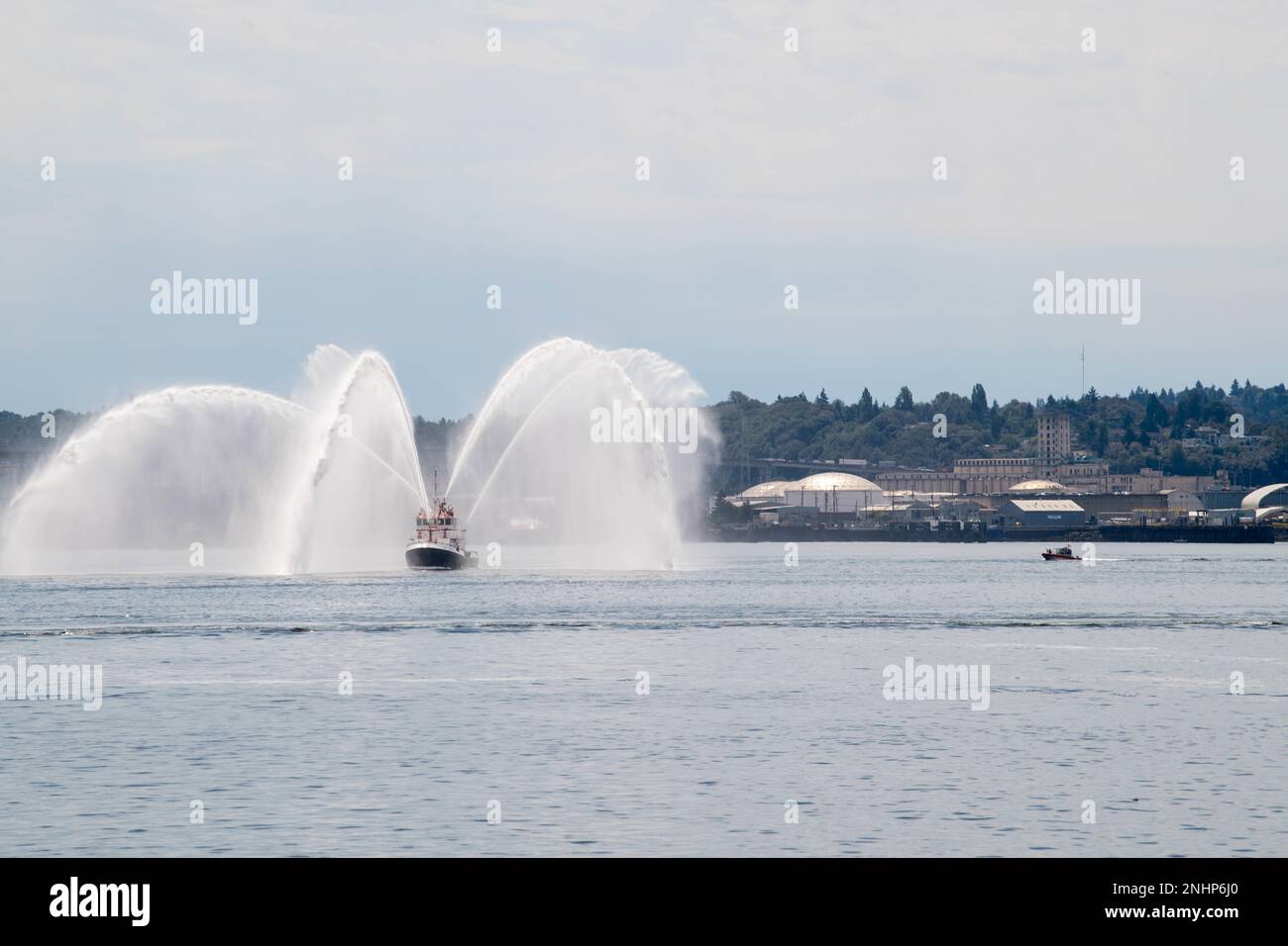Seattle Fire Department Fireboat Leschi sprays water as ships arrive in ...