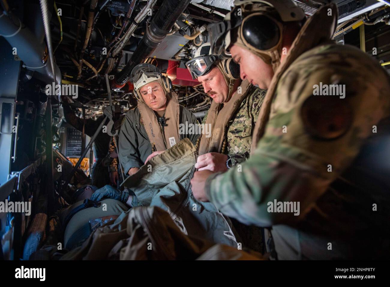 PACIFIC OCEAN (Aug. 1, 2022) From right, U.S. Army Capt. Zane Amrein ...