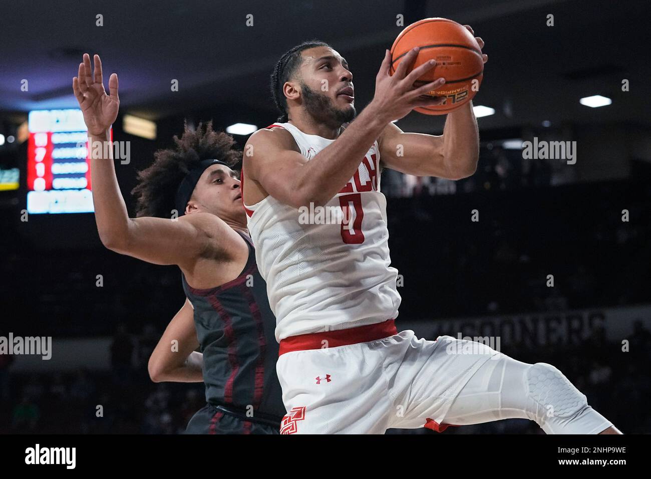 Texas Tech forward Kevin Obanor (0) grabs a rebound in front of ...