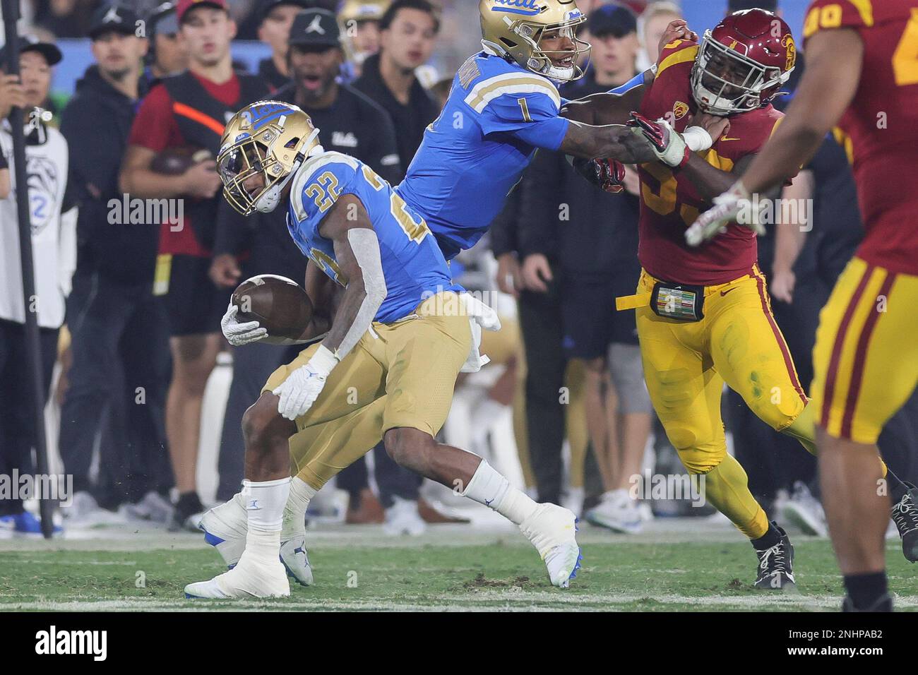 UCLA running back Keegan Jones (22) carries the ball on a running play ...