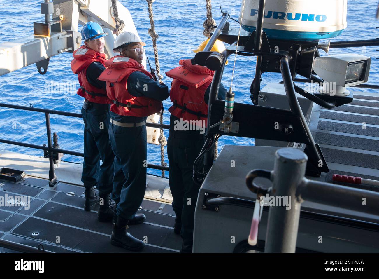 220802-N-CM110-1020 PACIFIC OCEAN (Aug. 2, 2022) – Sailors stand on an ...