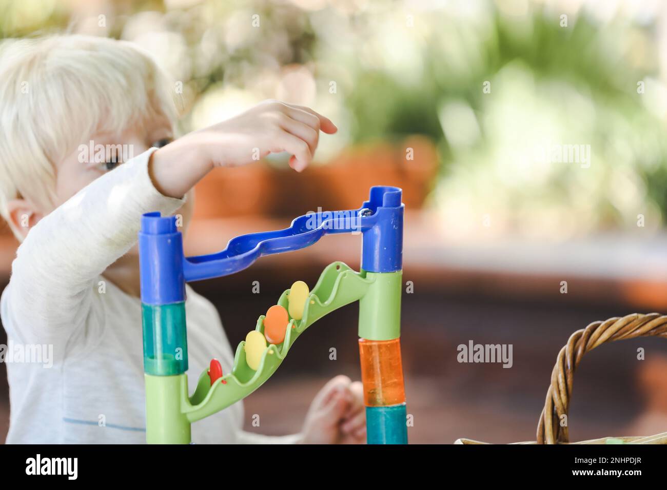 Playing marble run hi-res stock photography and images - Alamy