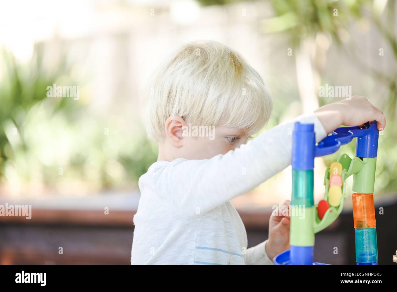 Playing marble run hi-res stock photography and images - Alamy