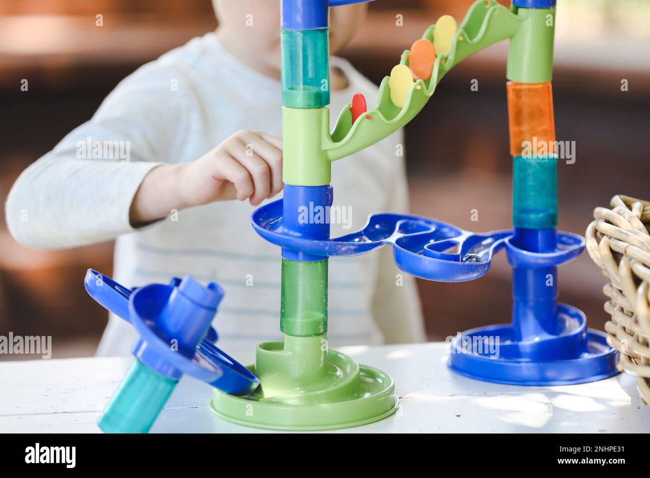 Playing marble run hi-res stock photography and images - Alamy