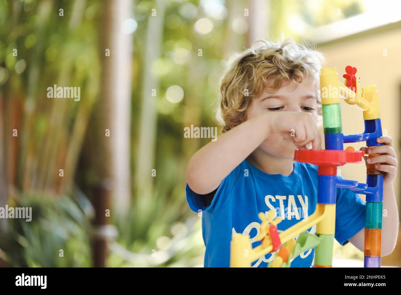Playing marble run hi-res stock photography and images - Alamy